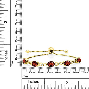 Gem Stone King 18K Yellow Gold Plated Silver Red Garnet and White Lab Grown Diamond Tennis Bracelet For Women (4.37 Cttw, Gemstone January Birthstone, Oval 7x5MM, Fully Adjustable Up to 9 Inch)