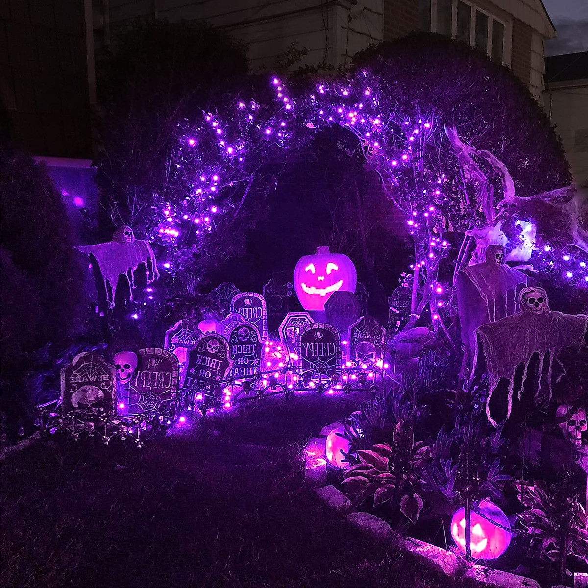 JMEXSUSS 4 Pack Purple Solar Christmas Lights, 100 LED 33ft Purple Solar Fairy Lights, 8 Modes Copper Wire Solar String Lights Outdoor Waterproof for Halloween Christmas Garden Yard Tree Decor