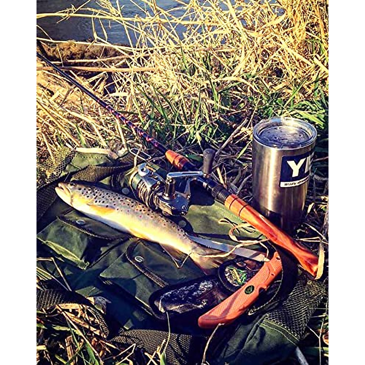 OUTDOOR EDGE Fish & Bone - Folding Fillet Knife with 5.0" 440A Stainless Steel Blade for Fish and processing big game - Pocket Clip (Orange)