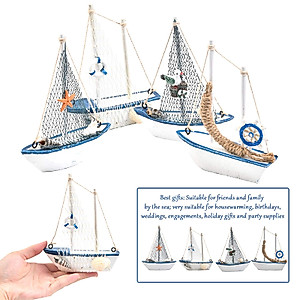 BUYGOO 4 Pack Mini Sailboat Model Decoration, Wooden Miniature Sailing Boat Home Decor Set, Beach Nautical Design, Navy Blue and White, for Ocean Theme Decoration, 4.3 x 5.3 x 1.25 Inches (4 Different Design)