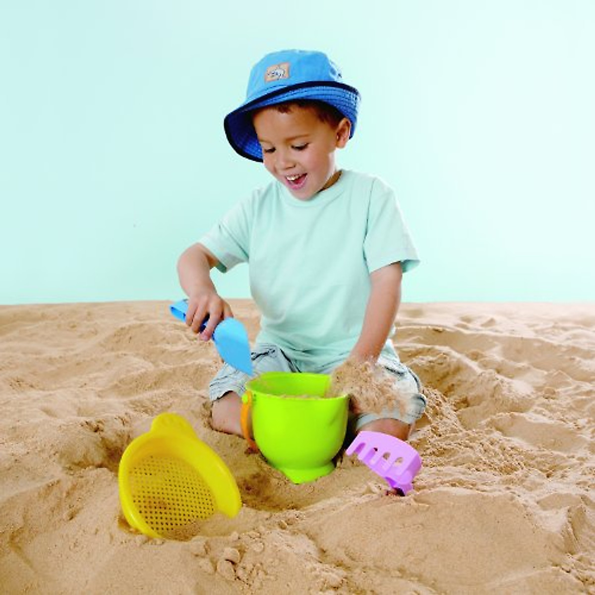 Hape Beach Basics Sand Toy Set Including Bucket Sifter, Rake, and Shovel Toys| Sand Toy Playset for Toddlers 18M+