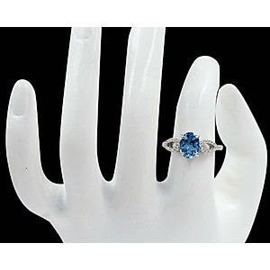 925 Sterling Silver Natural 9X7 MM Oval Cut Swiss Blue Topaz December Birthstone Solitaire Unisex Proposal Engagement Ring Wedding Jewelry Gift For Her (Rhodium Plated Silver, 7.5)