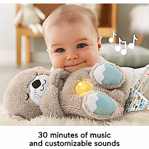 Fisher-Price Soothe 'n Snuggle Otter, Portable Plush Soother with Music, Sounds, Lights and Breathing Motion