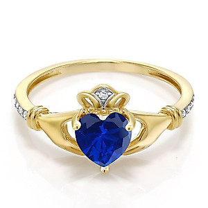 Gem Stone King 10K Yellow Gold Irish Celtic Claddagh Blue Created Sapphire and Diamond Accent Women Ring (0.86 Cttw, Available In Size 5, 6, 7, 8, 9)