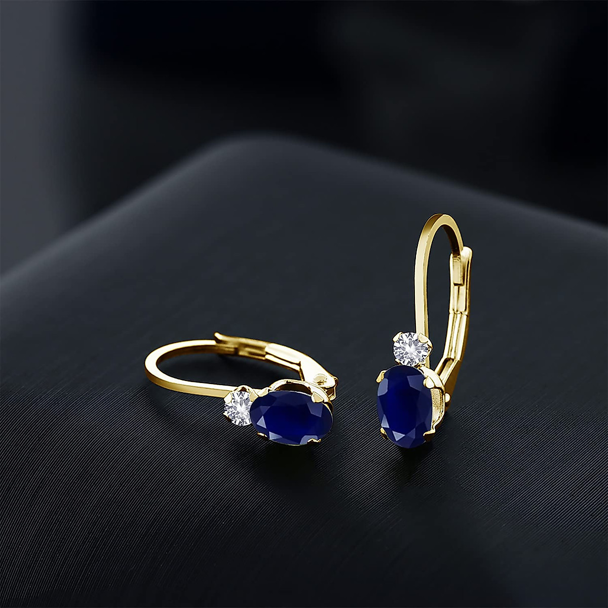 Gem Stone King 14K Yellow Gold Blue Sapphire and White Created Sapphire Leverback Earrings For Women | 1.18 Cttw | Gemstone September Birthstone | Oval 6X4MM, Round 2MM | 3/4 Inch
