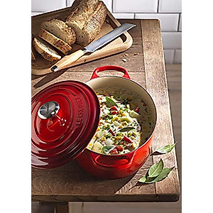 Le Creuset Enameled Cast Iron Signature Oval Dutch Oven, 9.5 qt., Cerise