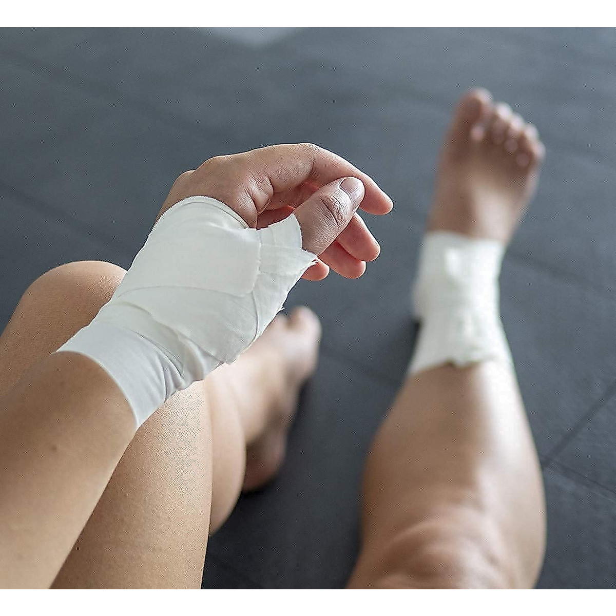 Titan Athletics - 12 Pack of Premium Quality White Athletic Tape/Sports Tape - 1.5 Inch x 45 Feet Per Roll - 100 Percent Cotton with Zinc Oxide - Easy Tear Zig Zag Design and No Sticky Residue