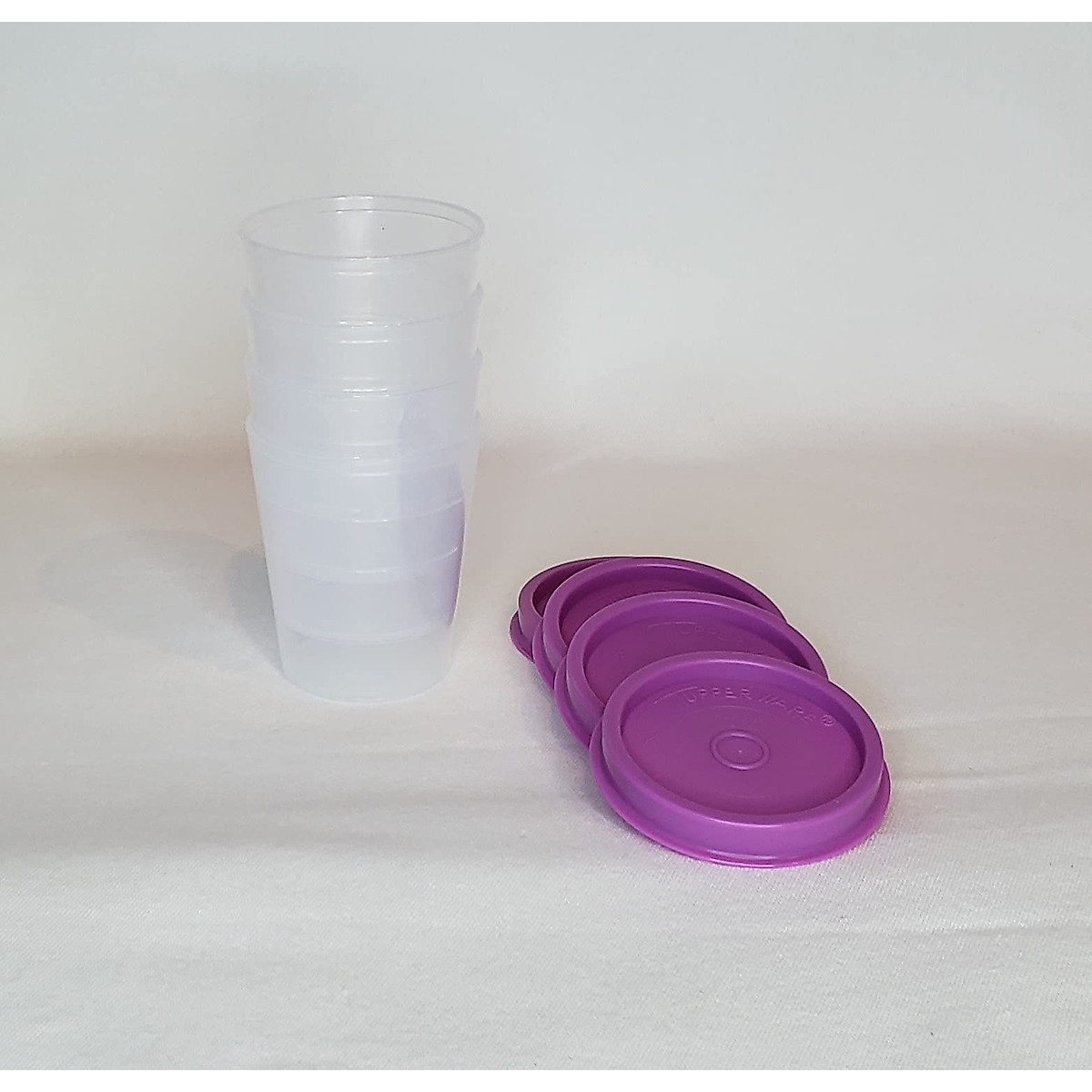 Tupperware Set of 4 Midgets with Purple Colored Seals (2 Oz Size)
