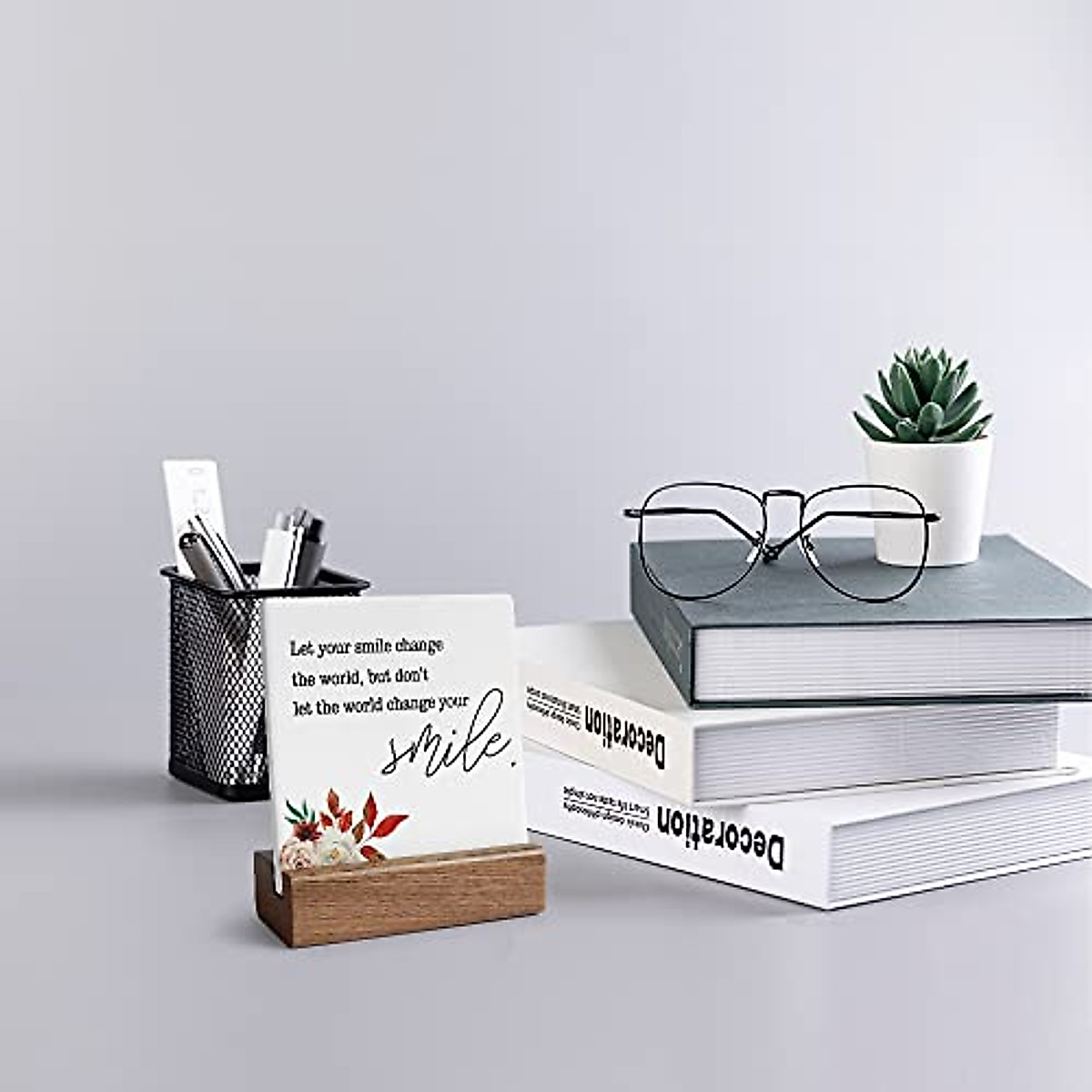 Pigort Let Your Smile Change the World Sign Decor Inspirational Desk Quote Sign Office Motivational Gifts Positive Quotes Ceramic Decor with Wooden Stand for Home Office Classroom Decoration