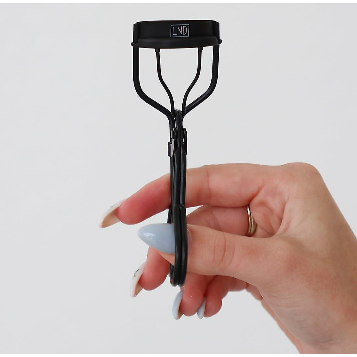 Lash Next Door Professional Eyelash Curler - Instant Long Lasting Curl, Lifts & Shapes - No Pinching or Creasing. Includes Replacement Pad (in Black)
