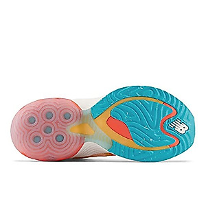 New Balance Women's FuelCell Rebel TR V1 Running Shoe, Solar Flare/White, 7.5 Wide