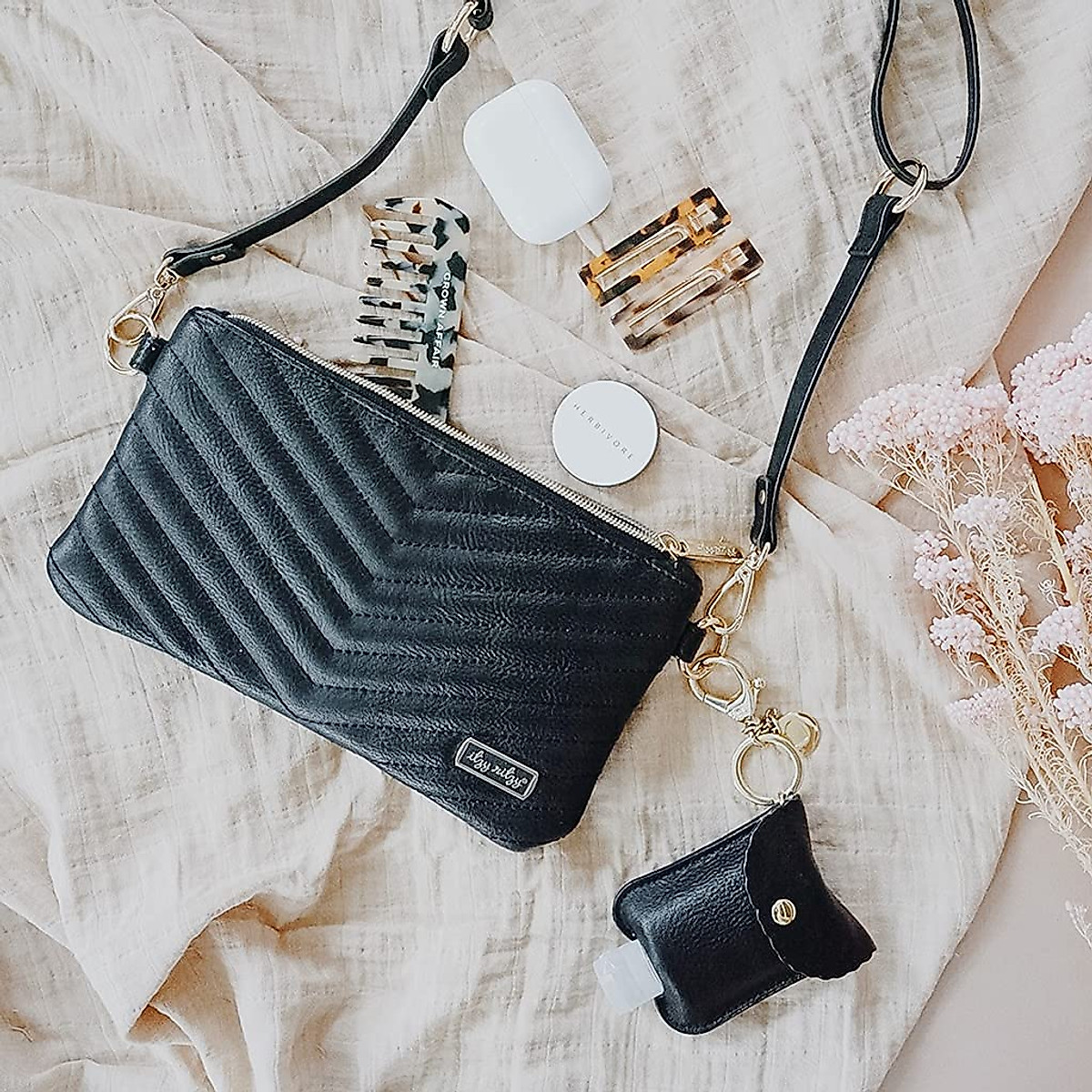 Itzy Ritzy Boss Pouch Wristlet, Crossbody Clutch & Belt Bag - Black Clutch Purse for Women - Includes Crossbody Strap & Wristlet Strap - Features 6 Card Slots & 2 Zippered Pockets (Jetsetter)