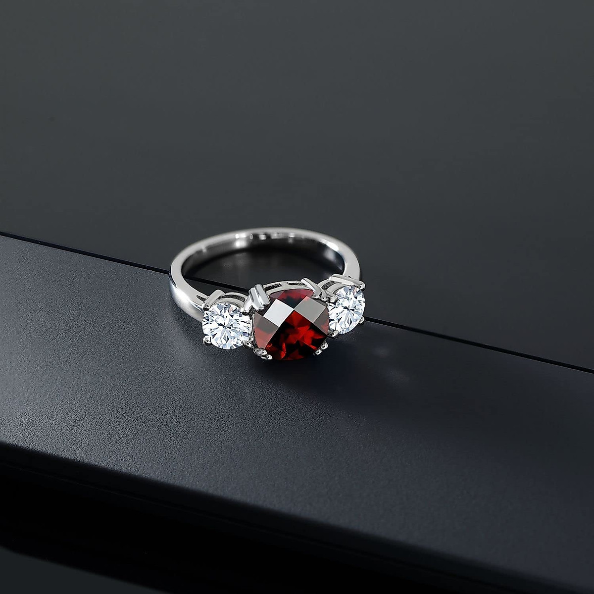 Gem Stone King 925 Sterling Silver Red Garnet and White Zirconia 3 Stone Engagement Ring For Women (3.90 Cttw, Gemstone January Birthstone, Cushion Checkerboard 8MM, Size 8)
