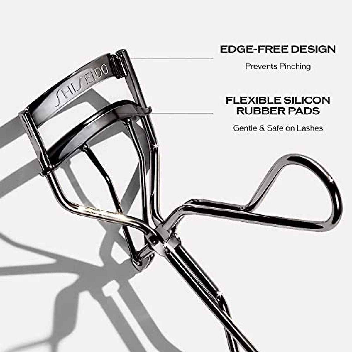 Shiseido Eyelash Curler - Crimps & Curls Lashes for Perfect, Eye-Framing Fringe - Gentle & Safe - Includes Replacement Pad
