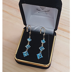 4.79 Carat 14k Solid White Gold Dangling Blue Topaz Earrings