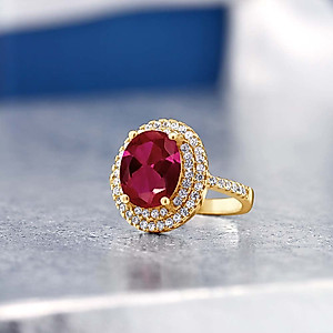 Gem Stone King 18K Yellow Gold Plated Silver Red Created Ruby Ring For Women (3.30 Cttw, Oval 9X7MM, Available in size 5, 6, 7, 8, 9)