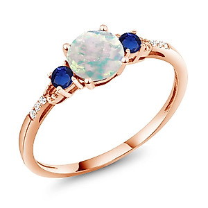 Gem Stone King 10K Rose Gold White Simulated Opal Blue Created Sapphire and White Diamond Accent 3-Stone Engagement Ring For Women (0.95 Cttw, Round Cabochon 6MM, Gemstone October Birthstone, Size 9)