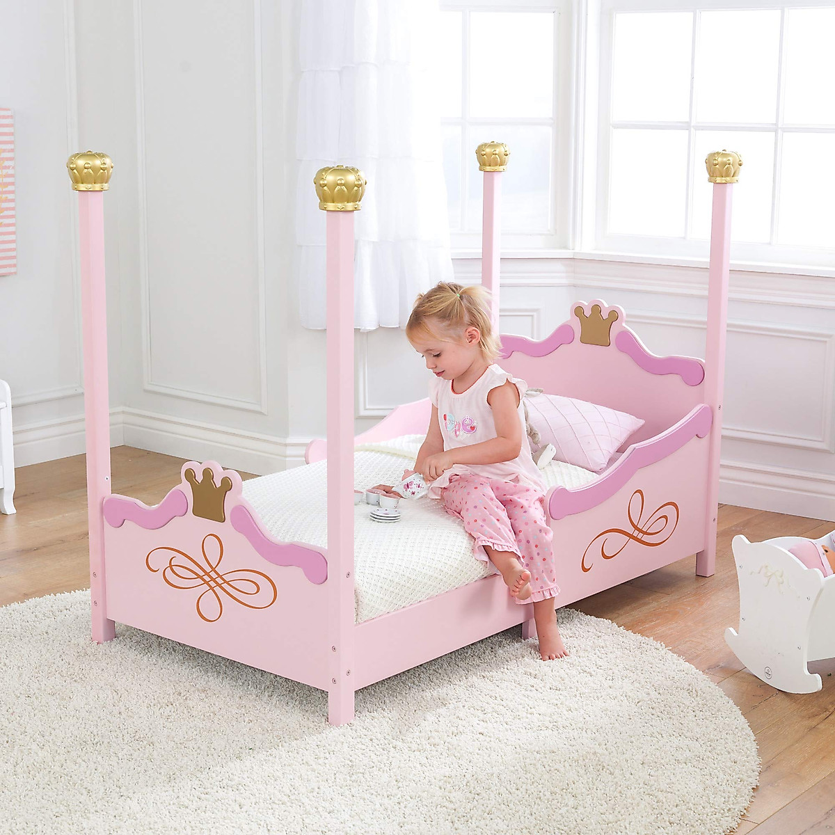KidKraft Wooden Princess Toddler Four-Poster Bed with Crown Accents, Children's Furniture - Pink, Gift for Ages 15 mo+
