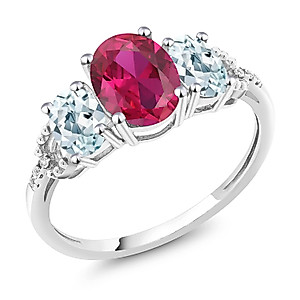 Gem Stone King 10K White Gold Oval Red Created Ruby Sky Blue Aquamarine and Diamond Accent 3 Stone Women Engagement Ring (2.06 Cttw) (Size 8)