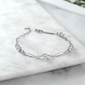 Gem Stone King 925 Sterling Silver Sky Blue Aquamarine and White Created Sapphire Tennis Bracelet For Women | 3.32 Cttw | Gemstone March Birthstone | Oval 7X5MM | 6 Inch + 1 Inch Extender