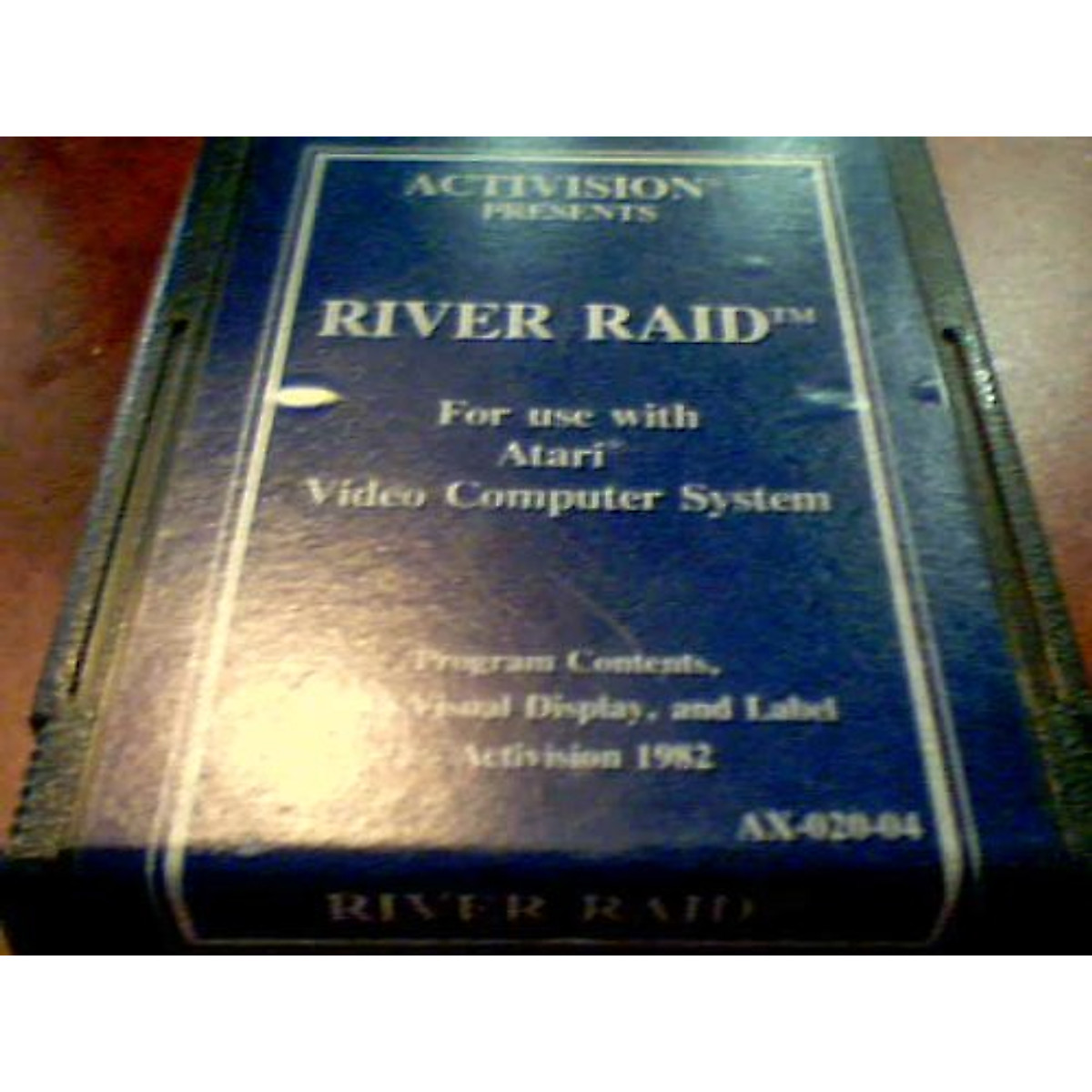 1982 Activision Presents "River Raid" Video Game Cartridge for Atari 2600---blue Image Label Version #Ax-020-04 (Activision Presents River Raid for Use with Atari Video Game System---program Contents Audio Visual Display, and Label---activision 1982 Ax-02