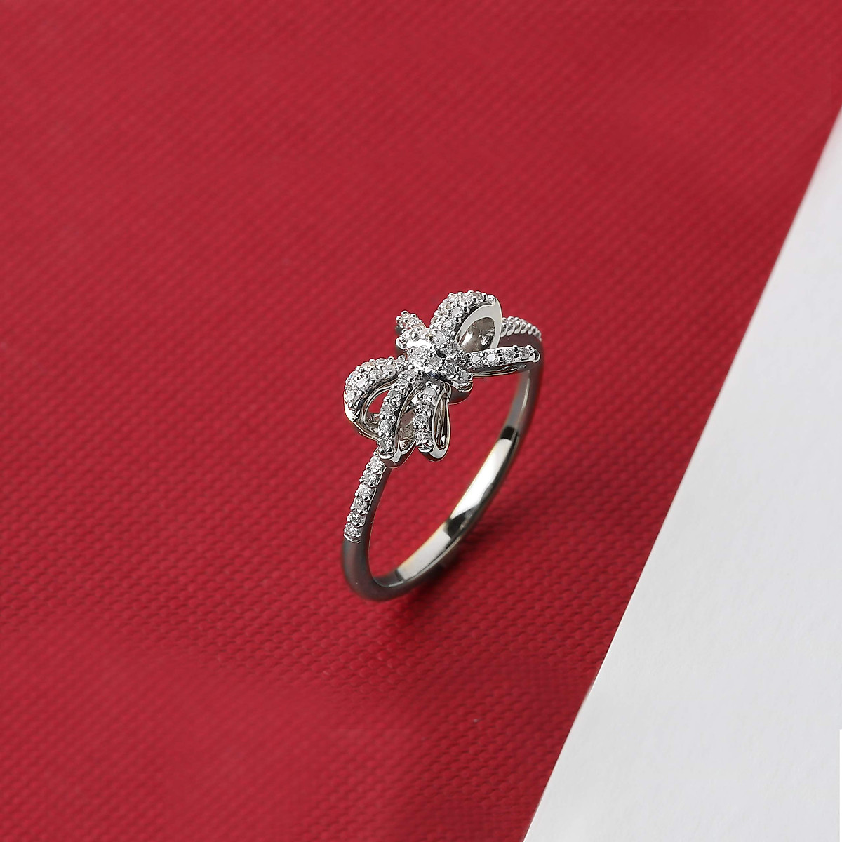 DZON 10k White Gold 1/6CT TDW Round Diamond Knot Bow Fashion Ring Love Gift for Women (I-J,I2)