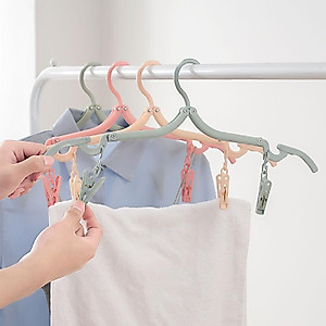 24 Pcs Travel Hangers with 48 Pcs Clips,Portable Folding Clothes Hangers Travel Clothes Hangers Travel Accessories Foldable Clothes Drying Rack for Travel Plastic Non Slip Clothing Hangers 4 Colors