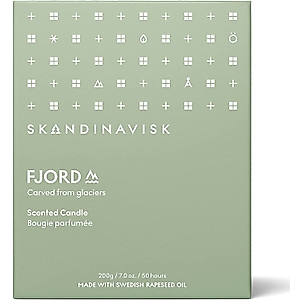 Skandinavisk Fjord Scented Candle. Fragrance Notes: Apple and Pear Blossom, Orchard Fruits and Redcurrants. 7.0 oz.