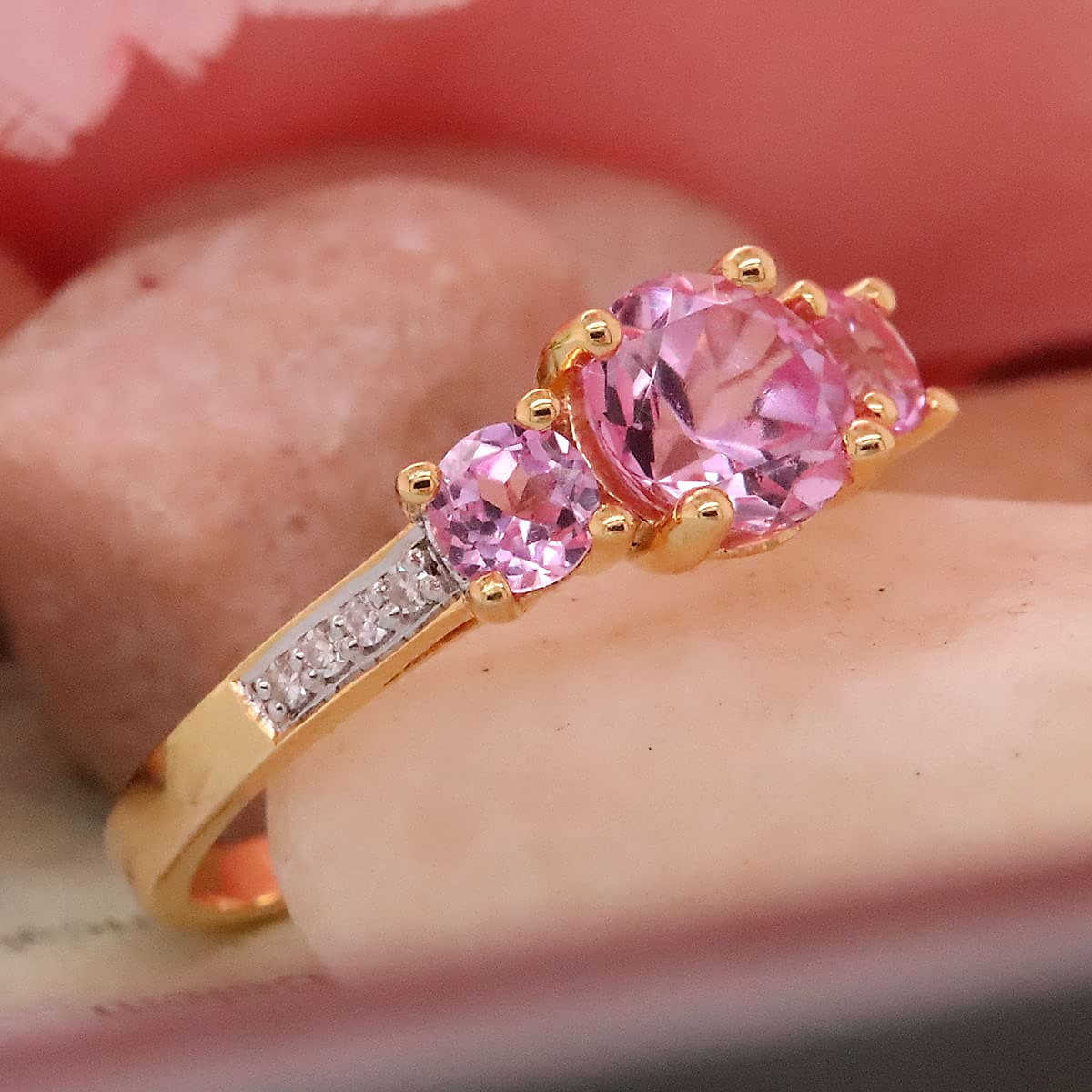 Dazzlingrock Collection 7 MM Centre & 4 MM Side Round Lab Created Pink Sapphire with Natural White Diamond Women Three Stone Engagement Ring | 10K Yellow Gold, Size 7