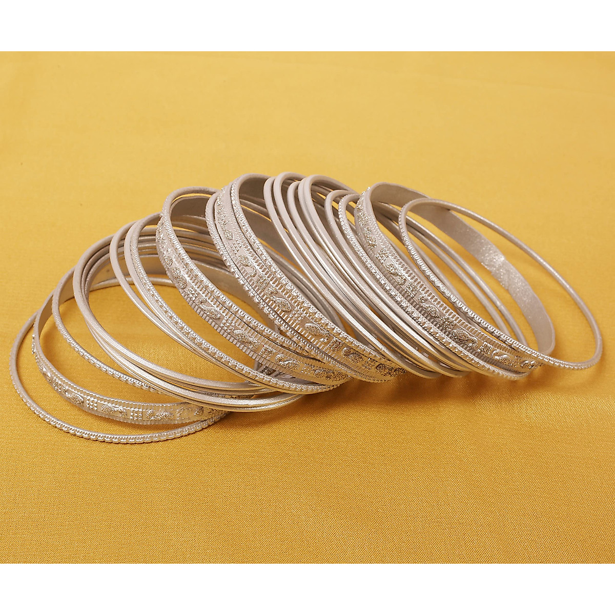 Touchstone Indian Bollywood Colorful 2 Dozen Bangle Collection Golden Glitters Textured Silver Color Designer Jewelry Special Bangle Bracelets Set of 24 in Gold Tone for Women.