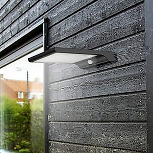 Bonashi LED Solar Motion Sensor Light Outdoor 2 Pack, Security Motion Activated Wall Lights with Mounting Poles for Gutter Patio Garden Path, Waterproof Cordless Exterior Foodlights