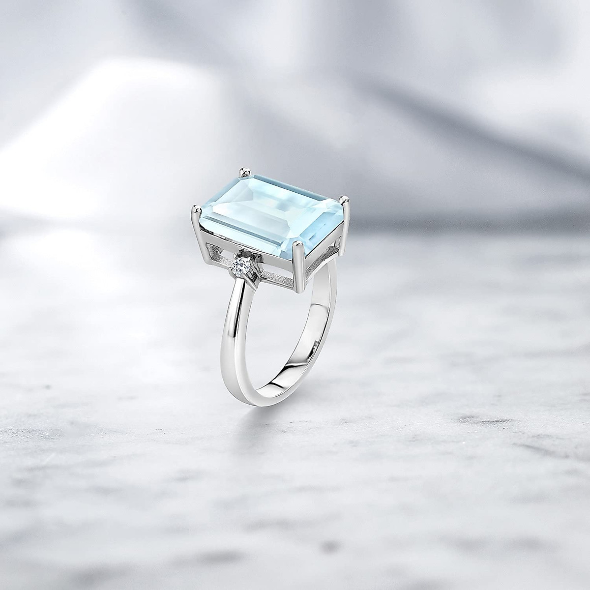 Gem Stone King 925 Sterling Silver Sky Blue Topaz and White Topaz Ring For Women (9.43 Cttw, Emerald Cut 14x10MM, Gemstone November Birthstone, Available In Size 5, 6, 7, 8, 9)