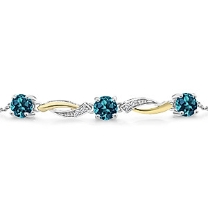 Gem Stone King 925 Silver and 10K Yellow Gold London Blue Topaz and White Lab Grown Diamond Tennis Bracelet For Women (2.14 Cttw, Gemstone Birthstone, 7 Inch, with 1 Inch Extender)