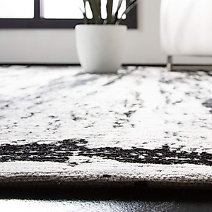 SAFAVIEH Classic Vintage Collection Area Rug - 8' x 10', Navy & Ivory, Abstract Design, Non-Shedding & Easy Care, Ideal for High Traffic Areas in Living Room, Bedroom (CLV702N)