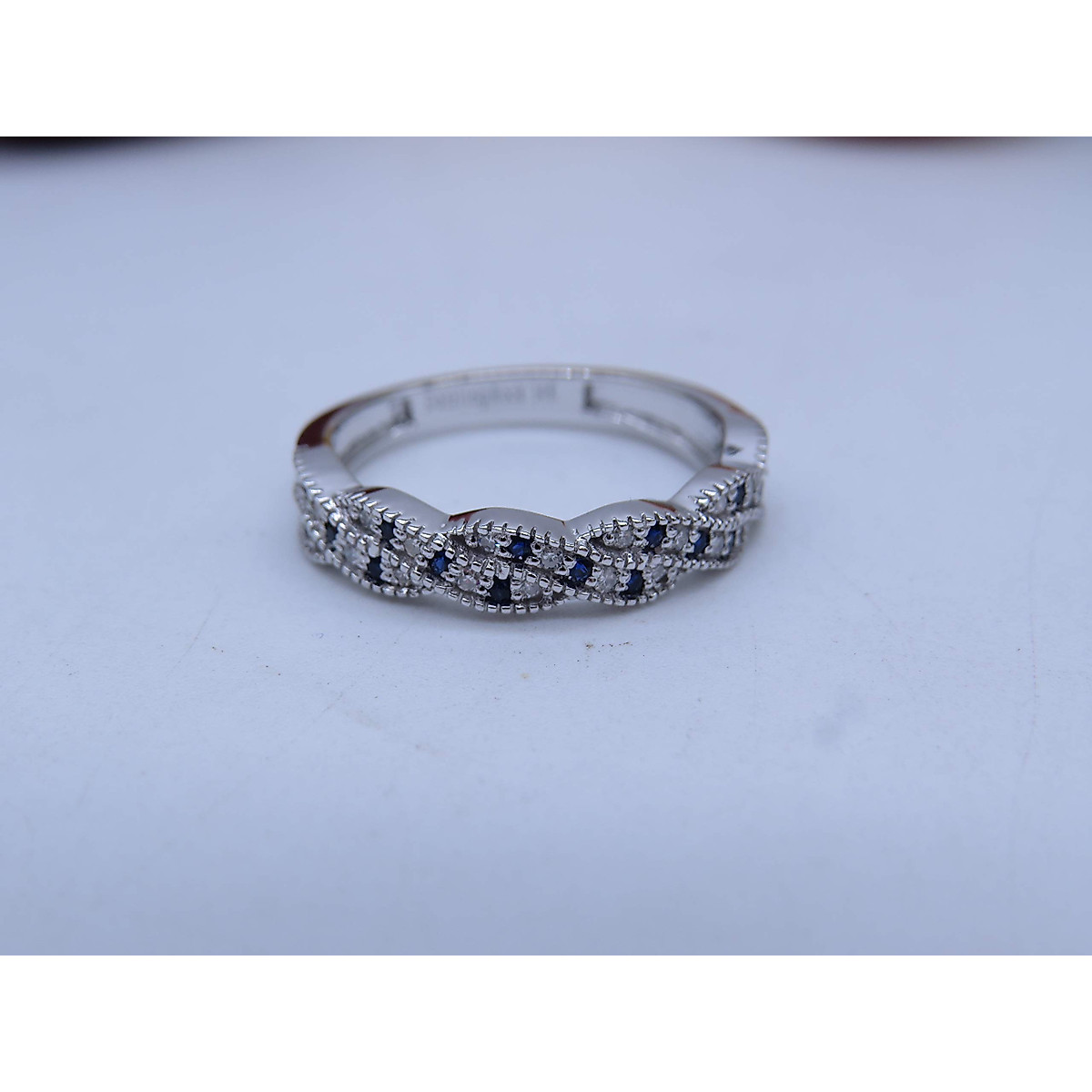 Dazzlingrock Collection 10K Round White Diamond & Blue Sapphire Women Anniversary Wedding Band Swirl Ring, White Gold, Size 7