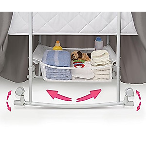 Wishes Oval Rocking Baby Bassinet with Bedding, Storage, and Pad