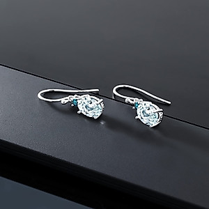Gem Stone King 10K White Gold Sky Blue Aquamarine and Blue Diamond Dangle Earrings For Women (2.33 Cttw, Gemstone Birthstone, Oval 8x6mm)