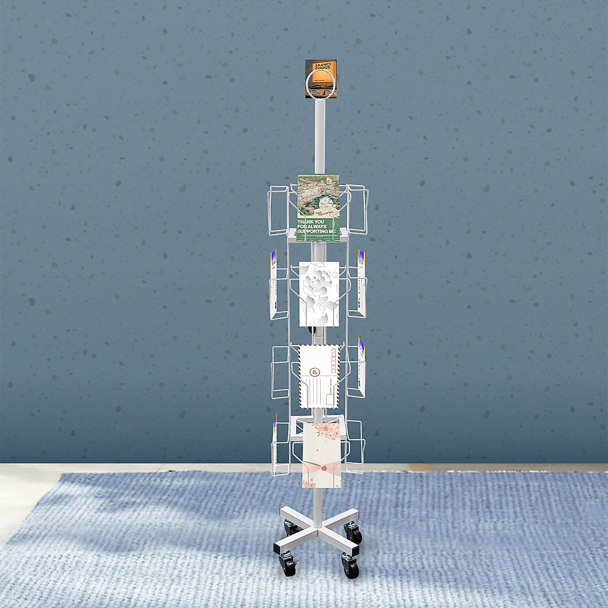 Vintoro Storage Stand Assistant, 360° Rotating Greeting Card Rack with 4 Universal Wheels,16-Pocket Display Stand Spinning, 31.5*12.6*5.12in,for Classroom Office Library Craft Show, White