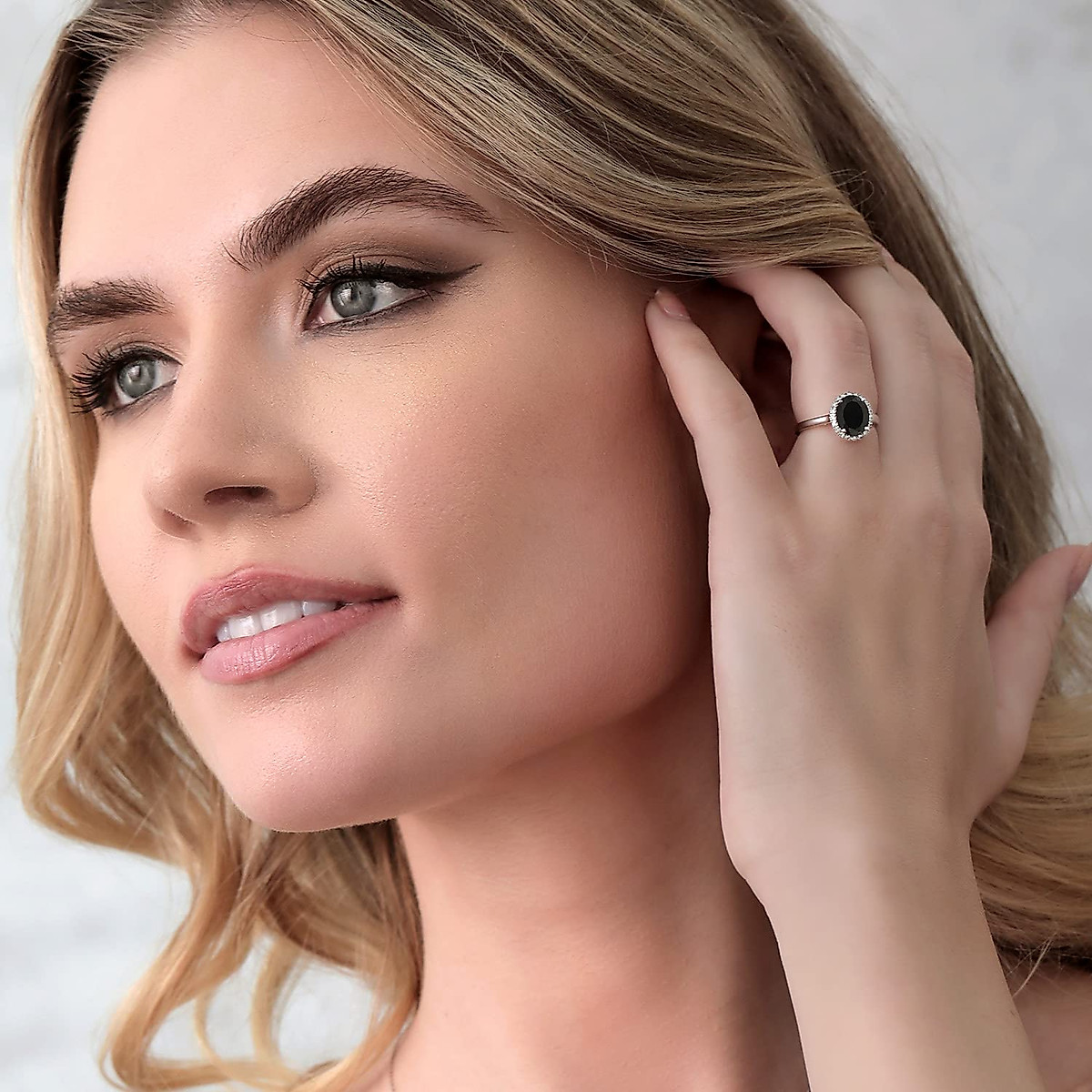 Gem Stone King 10K White Gold Black Onyx and Diamond Halo Engagement Ring | 2.14 Cttw | Oval 9X7MM | Gemstone Birthstone | Wedding Anniversary Promise Ring For Women (Size 8)