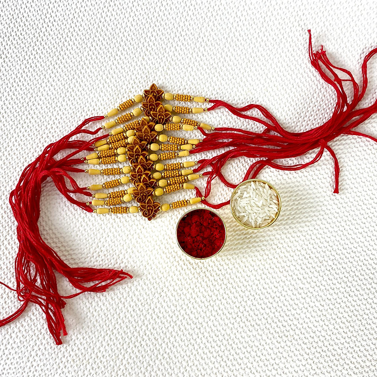 CRAFTONE Set of 12 Ganesha Design Rakhi for Brother, Designer Rakhi Set for Raksha Bandhan, Small Beads Rakhi Thread Bhaiya Bhabhi Sister Rakhi Band for Rakshabandhan with Roli Chawal