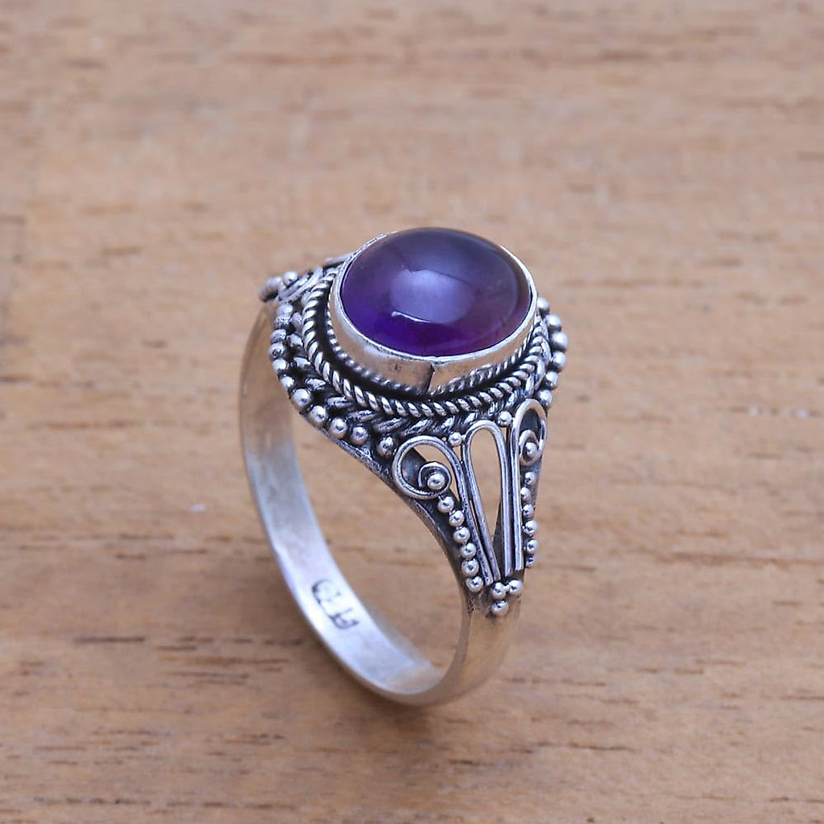 NOVICA Artisan Handmade Amethyst Singlestone Ring from Bali Sterling Silver Indonesia Birthstone Gemstone [ring Front 0.6 in H x 0.4 in W x 0.3 in D Band Width 3 mm W] ' Princess Gem'