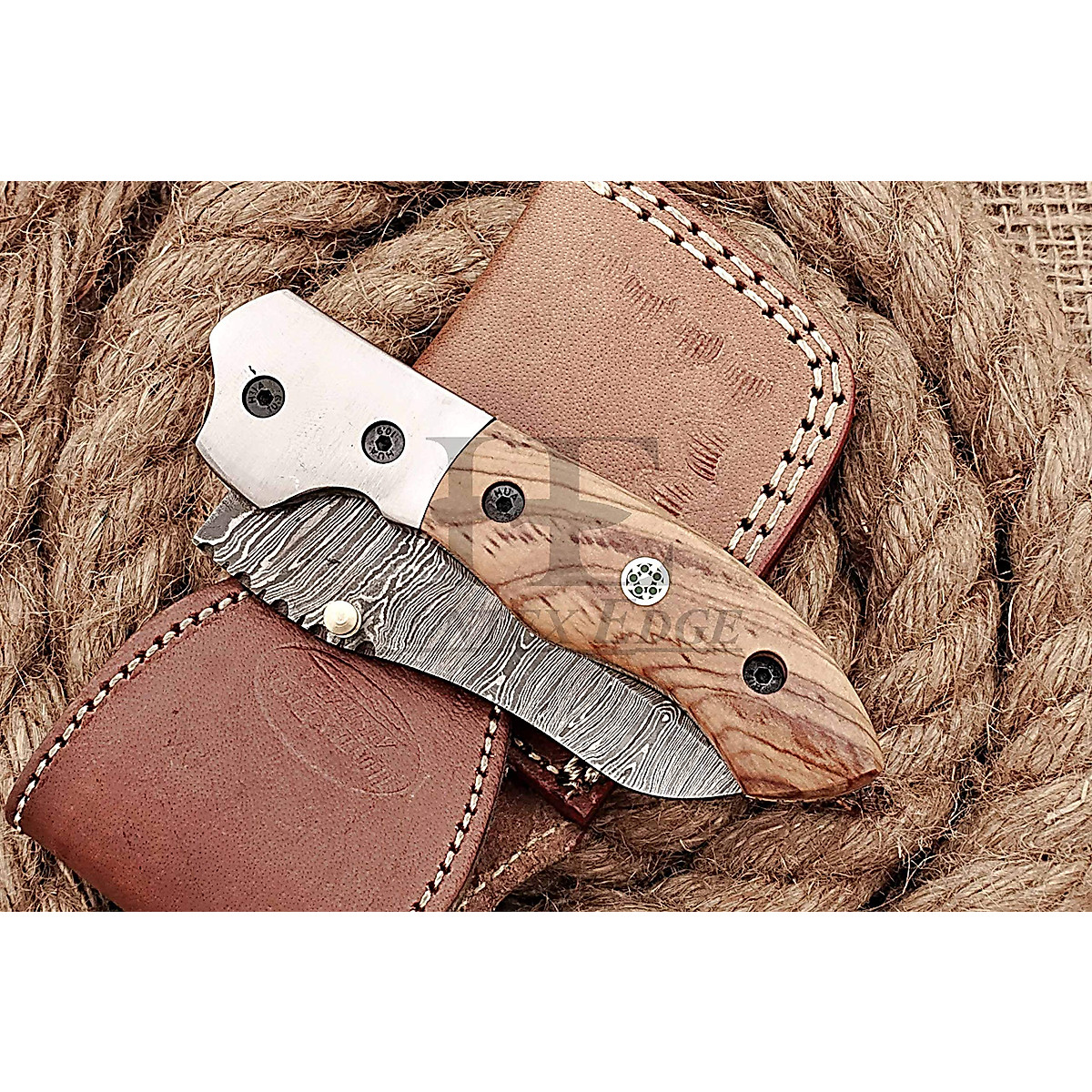 HUNTEX Custom Handmade Hand-Forged Twist Pattern Damascus Steel 3.7 Inch Long Natural Olive Wood Handle Razor Sharp Hunting Folding Pocket Wharncliffe Knife with Pocket Clip & Genuine Leather Pouch
