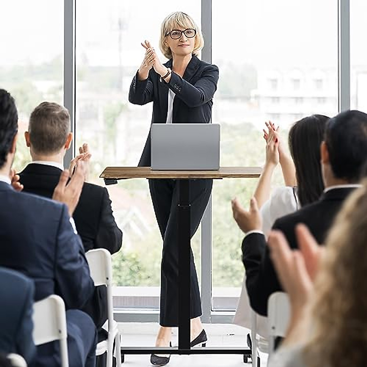 DUMOS Small Standing Desk Mobile Portable Rolling Laptop PC Table on Wheels Adjustable Height Computer Workstation for Home Office, 19 Inch, Brown