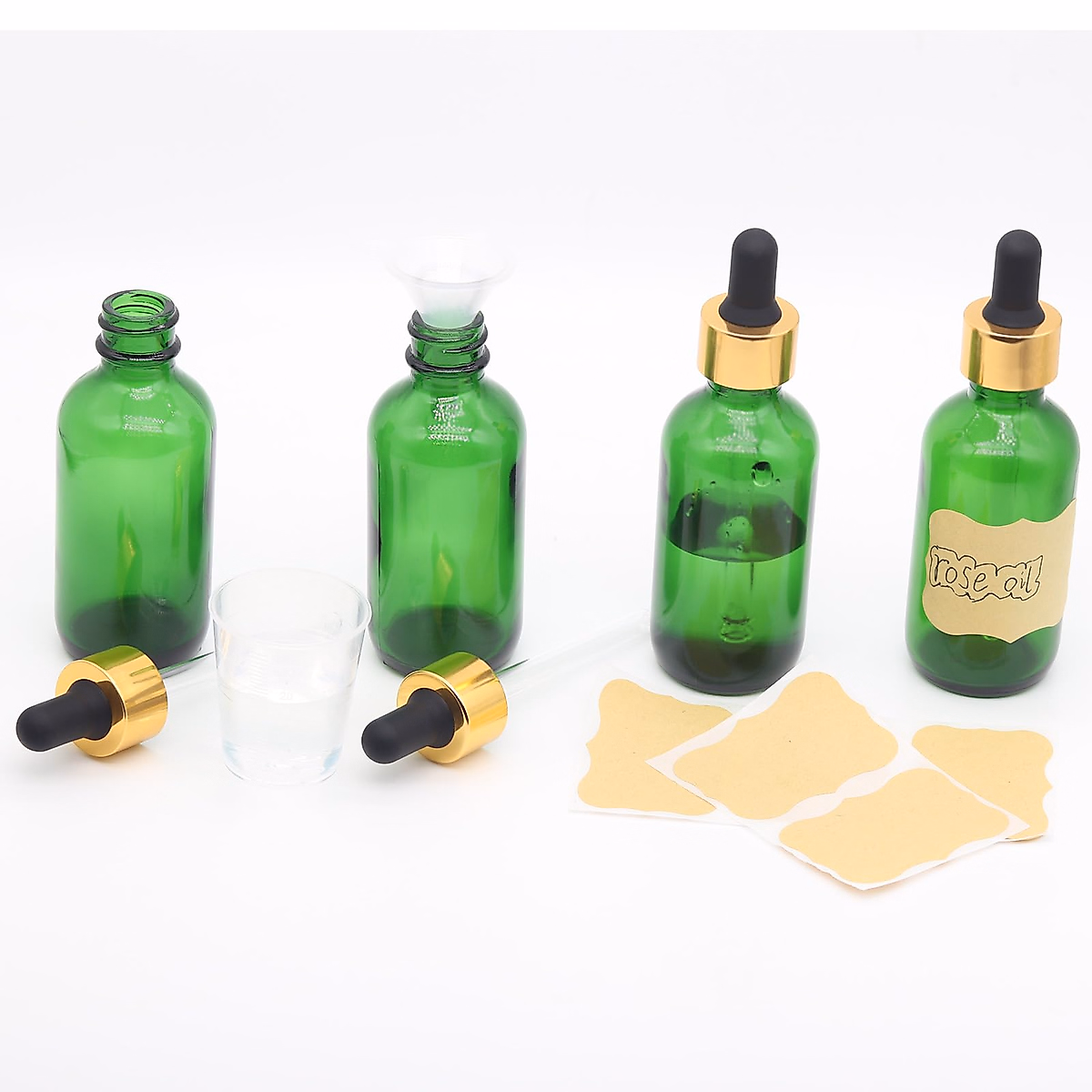 Toaazhy 4 pack,green glass dropper bottles 2 oz,60 ml dark empty tincture bottles with dropper,alcohol,hair oil bottle,eye,small,droppers for oils,medicine,pipette,drip drop,travel,perfume,essentia