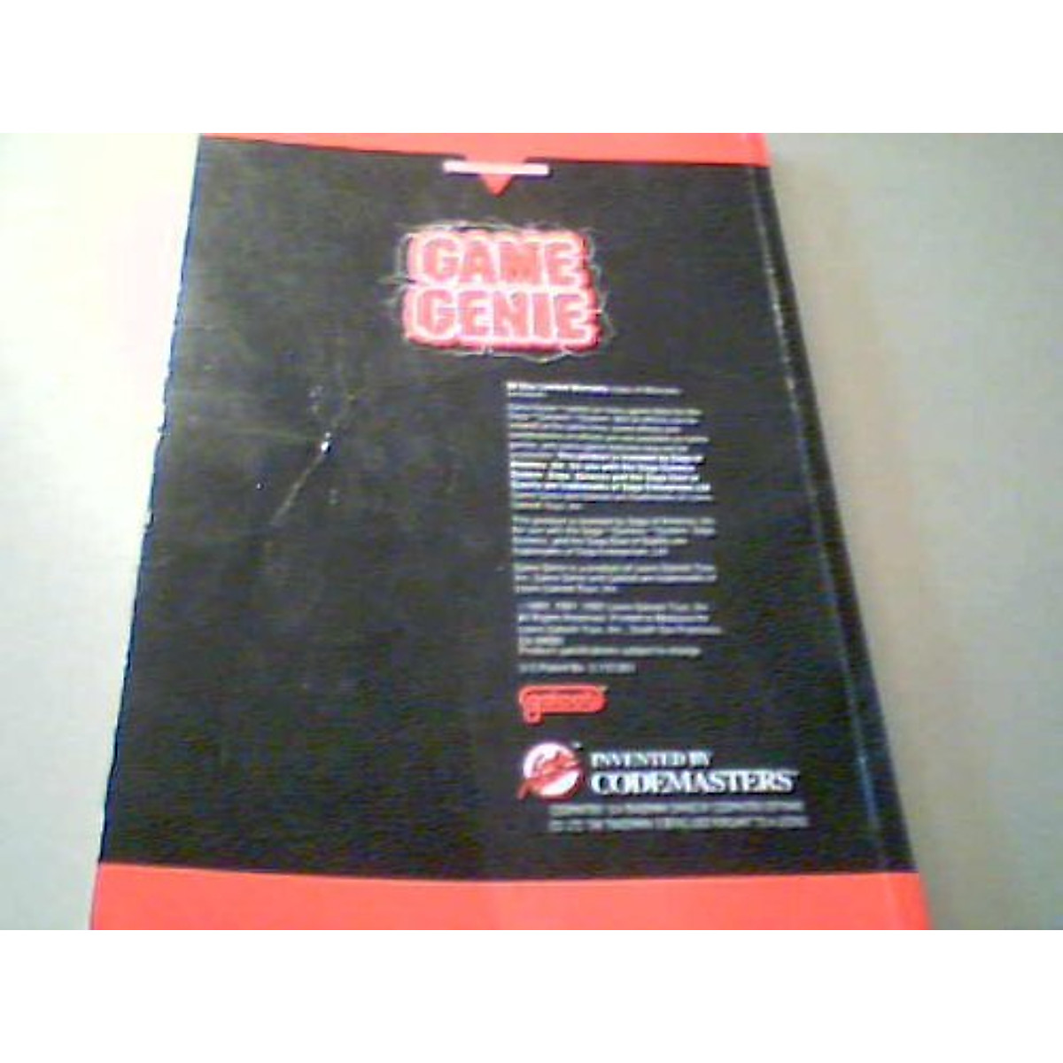 1990, 1991, 1992 Lewis Galoob Toys, Inc. Codemasters Software Co. Ltd. Galoob Video Game Enhancer for Sega Genesis---programming Manual and Codebook---softcover, 162 Pages, Sega Genesis Version