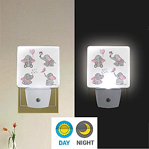 Naanle Set of 2 Cute Cartoon Baby Elephant Hold Heart Shape Balloon Flowers Play Butterfly Water Drop Fountain Nightlight Auto Sensor LED Dusk to Dawn Night Light Plug in Indoor for Adults