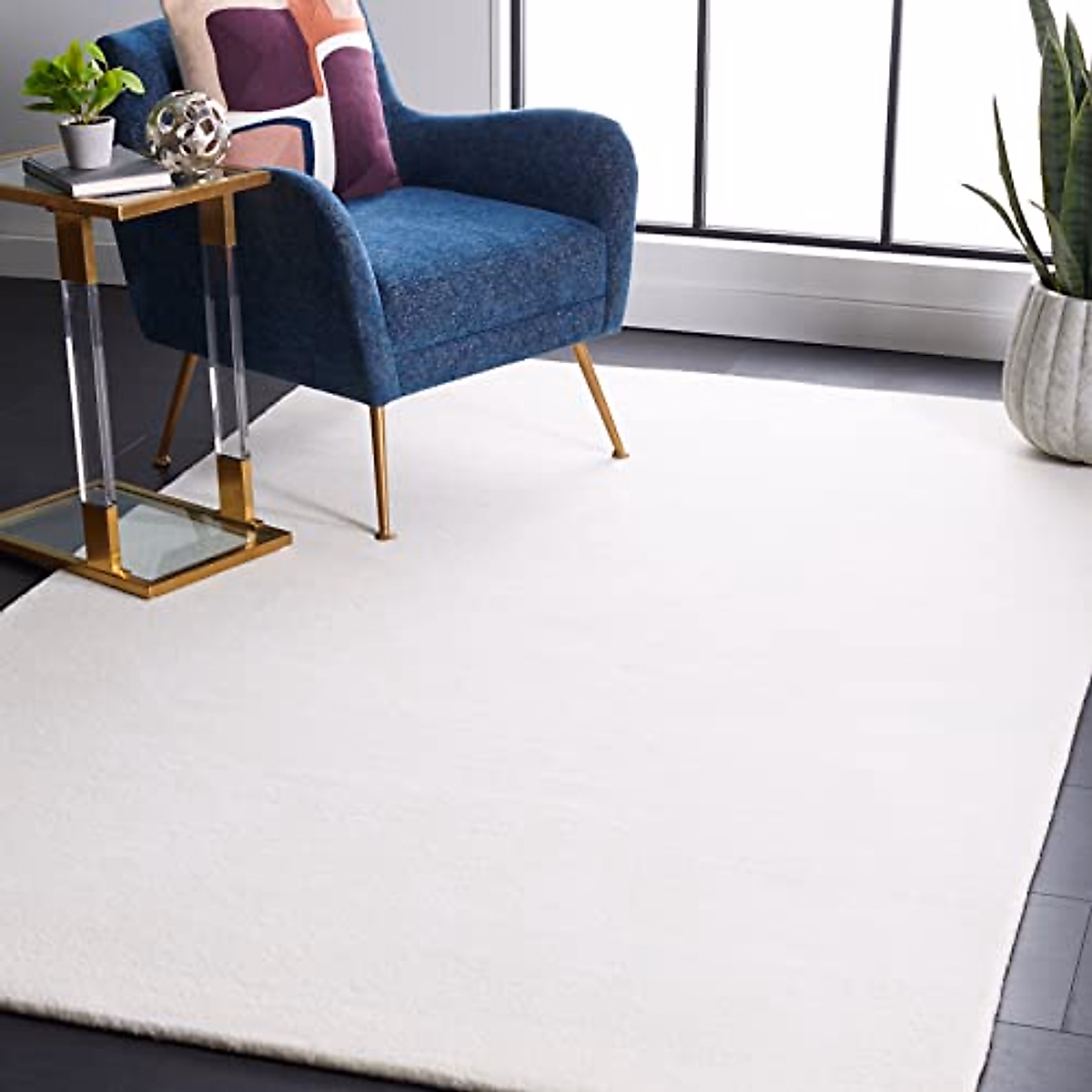 SAFAVIEH Fifth Avenue Collection Area Rug - 6' x 9', Ivory, Handmade Modern Solid Wool, Ideal for High Traffic Areas in Living Room, Bedroom (FTV128A)