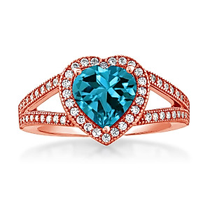 Gem Stone King 18K Rose Gold Plated Silver London Blue Topaz and White Moissanite Ring For Women (2.86 Cttw, Gemstone November Birthstone, Heart Shape 8MM, Available In Size 5,6,7,8,9)