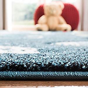 SAFAVIEH Carousel Kids Collection Accent Rug - 4' x 6', Navy & Ivory, Non-Shedding & Easy Care, Ideal for High Traffic Areas for Boys & Girls in Playroom, Nursery, Bedroom (CRK167N)