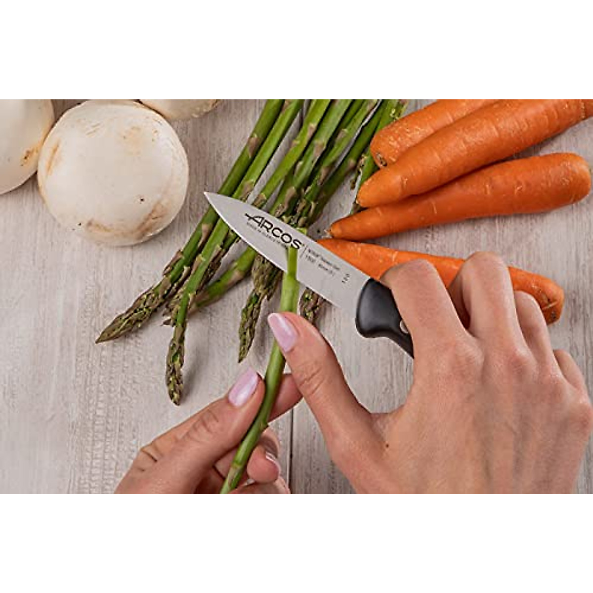 ARCOS Paring Knife 3 Inch Stainless Steel. Professional Kitchen Knife for Peeling Fruits and Vegetables. Ergonomic Polyoxymethylene Handle and 80mm Blade. Series Maitre. Color Black